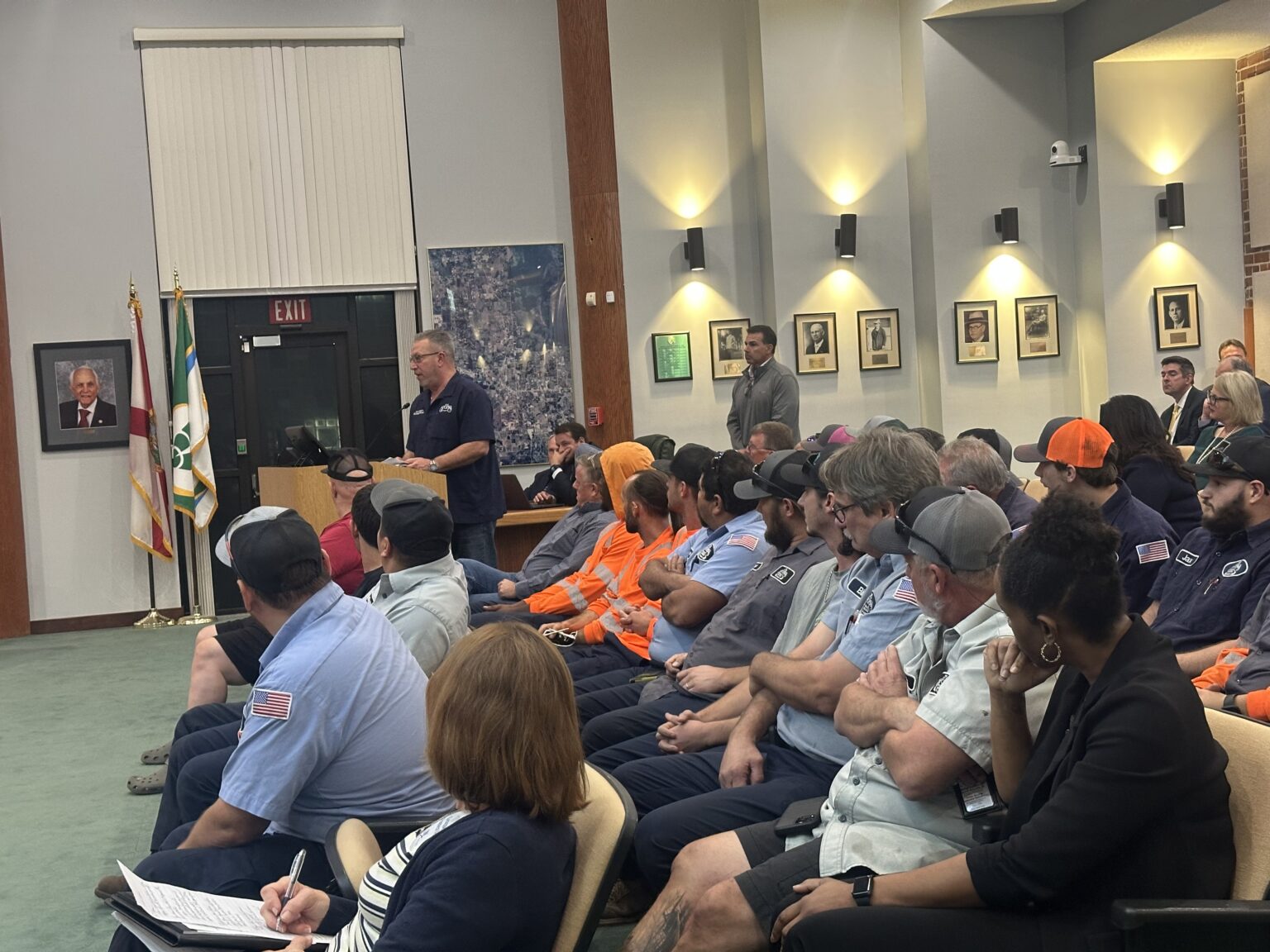 Council approves first reading of employees' pension increase